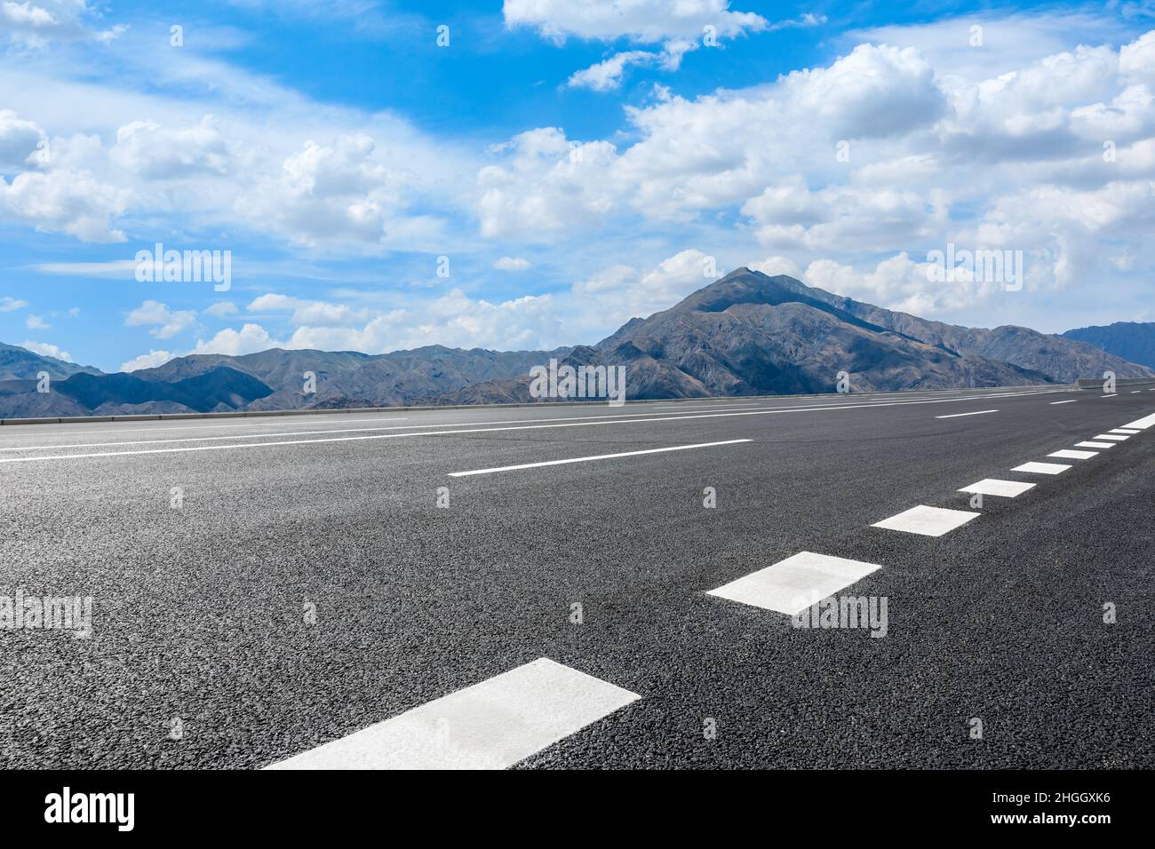 Highway ground and mountain natural scenery under blue sky.Landscape ...