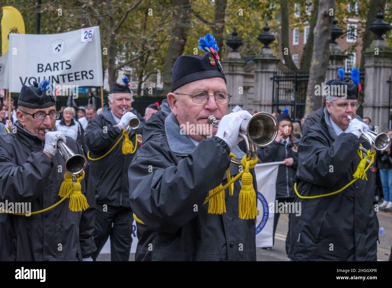 Close up of men blowing bugles with the Bugles & Drums of The Stedfast ...