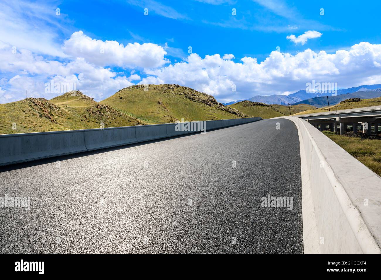 Highway ground and mountain natural scenery under blue sky.Landscape ...