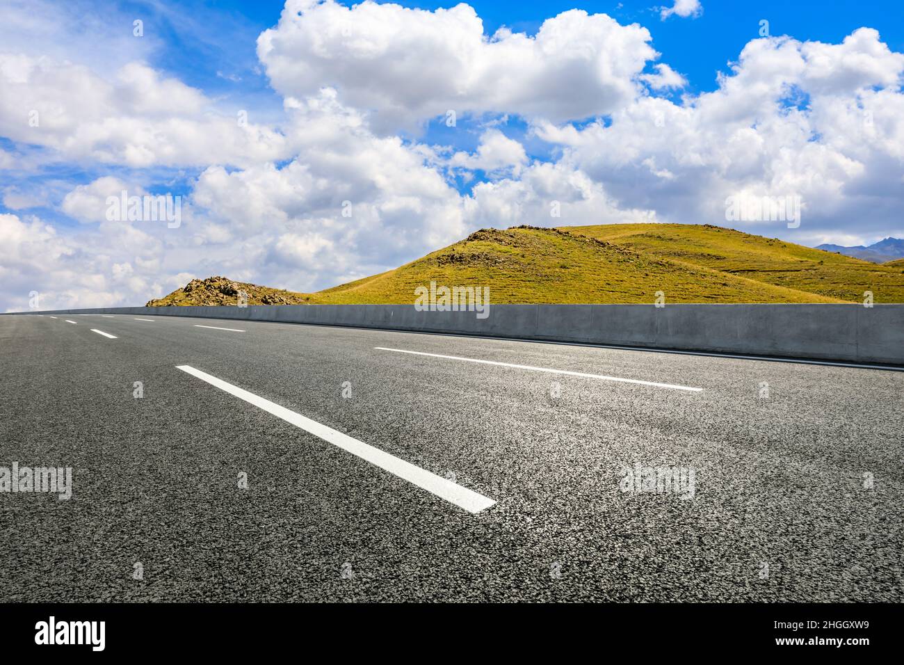 Highway ground and mountain natural scenery under blue sky.Landscape ...