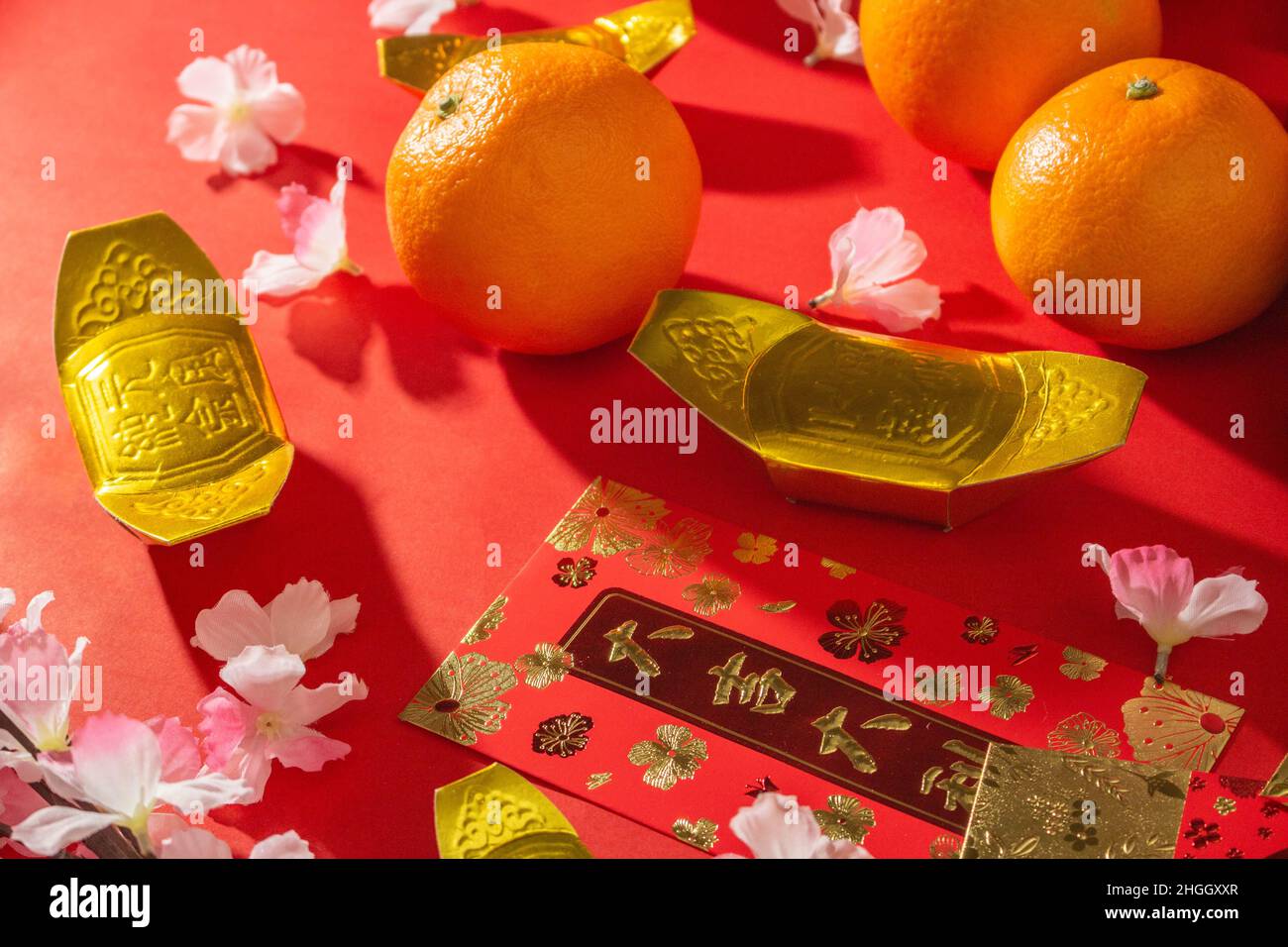 Flat lay mockup for holiday Chinese new year red packet and gold ...