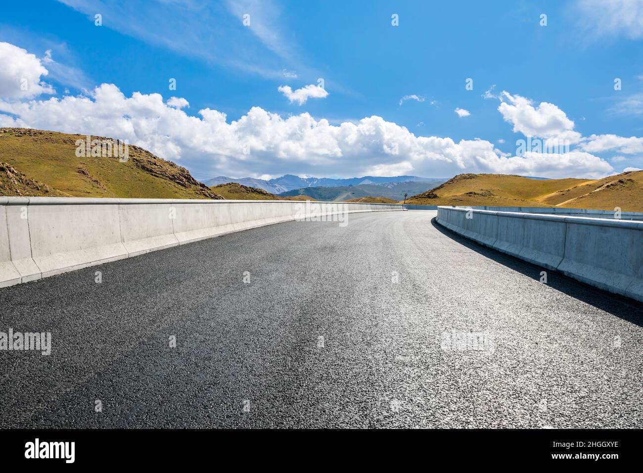 Highway ground and mountain natural scenery under blue sky.Landscape ...