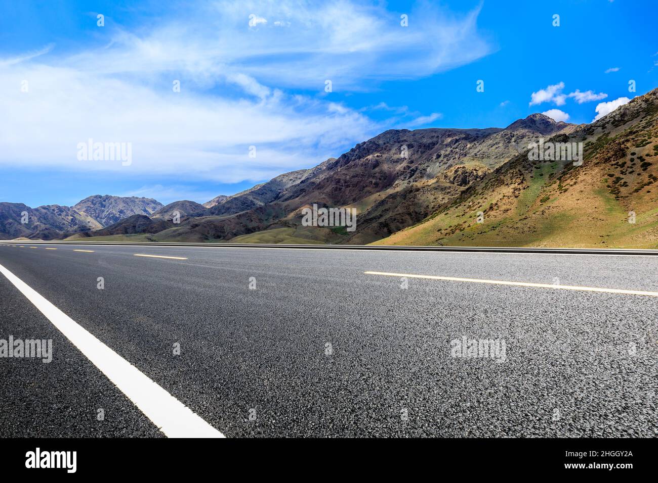 Highway ground and mountain natural scenery under blue sky.Landscape ...