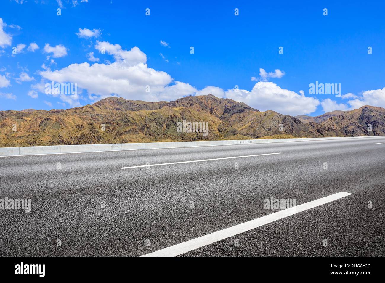Highway ground and mountain natural scenery under blue sky.Landscape ...