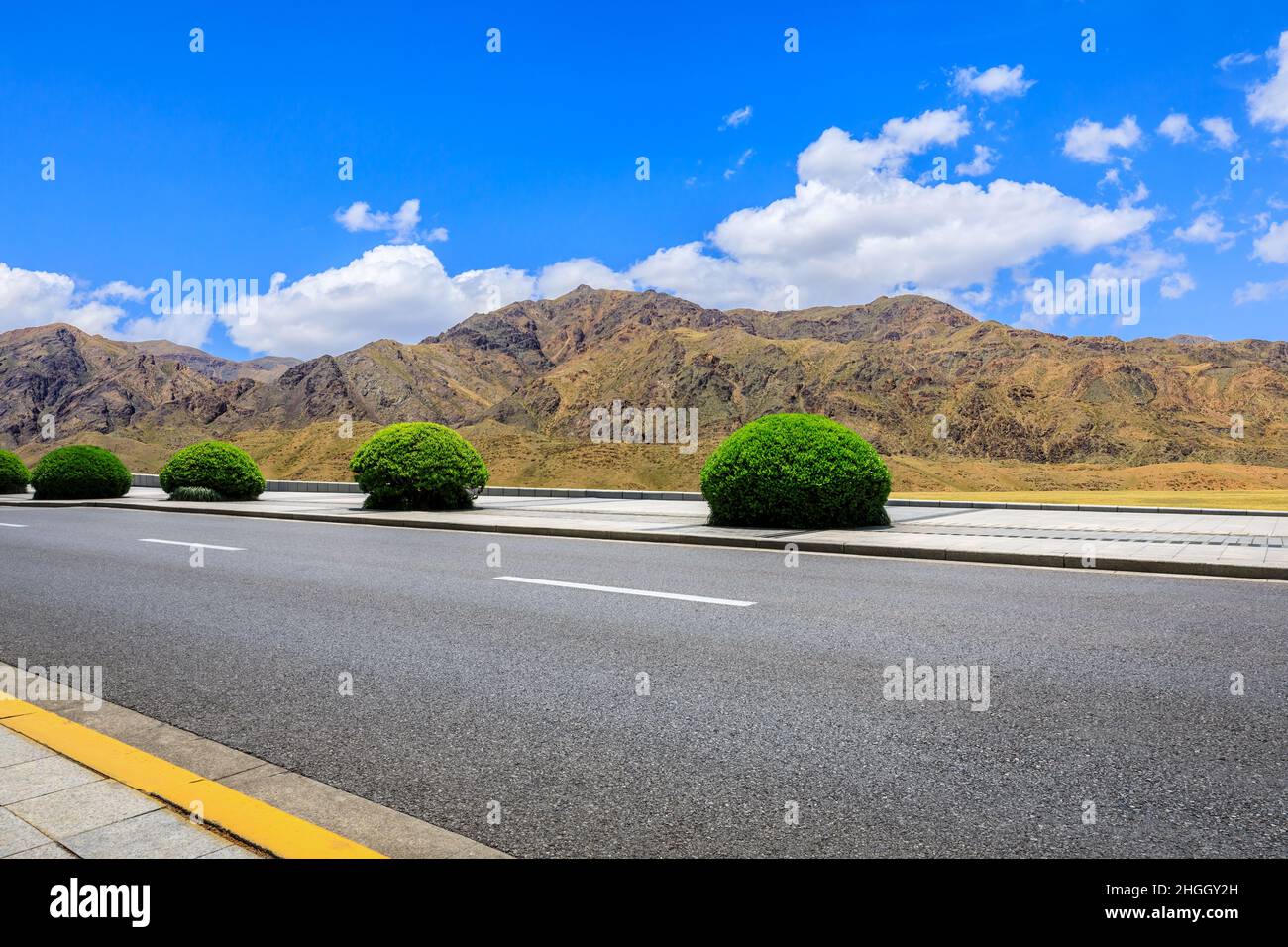 Highway ground and mountain natural scenery under blue sky.Landscape ...