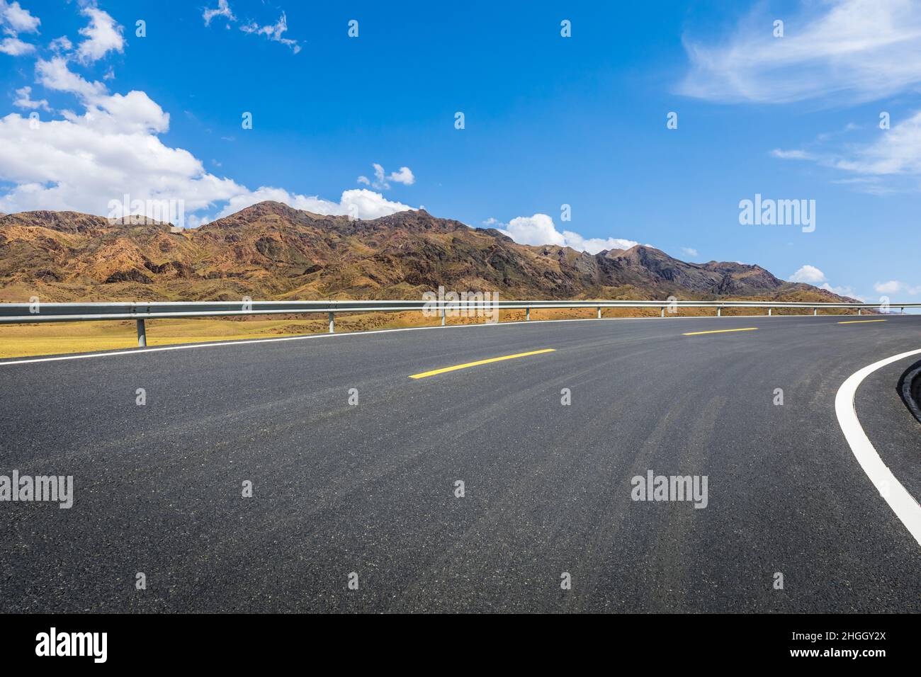 Highway ground and mountain natural scenery under blue sky.Landscape ...