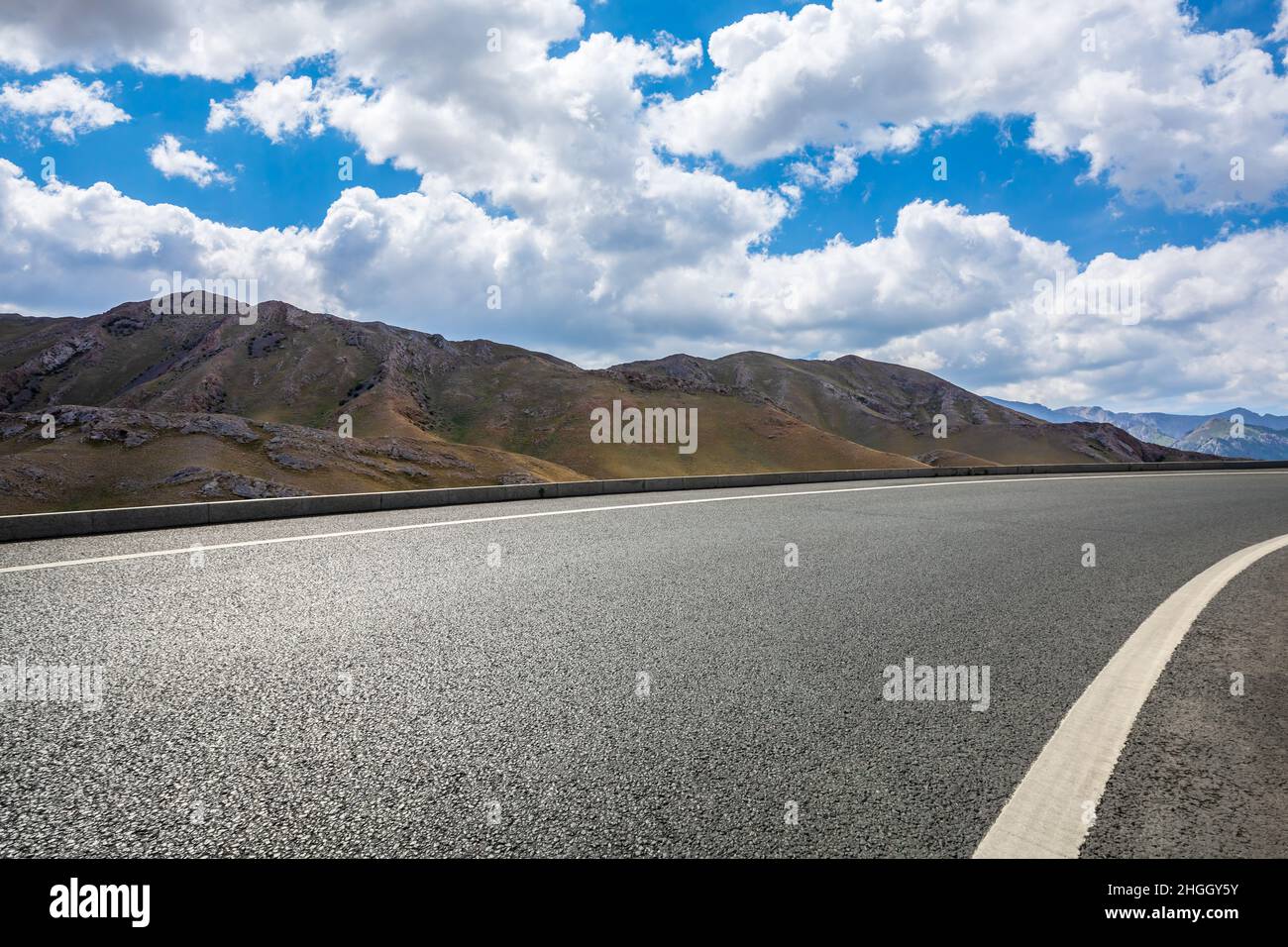 Highway ground and mountain natural scenery under blue sky.Landscape ...