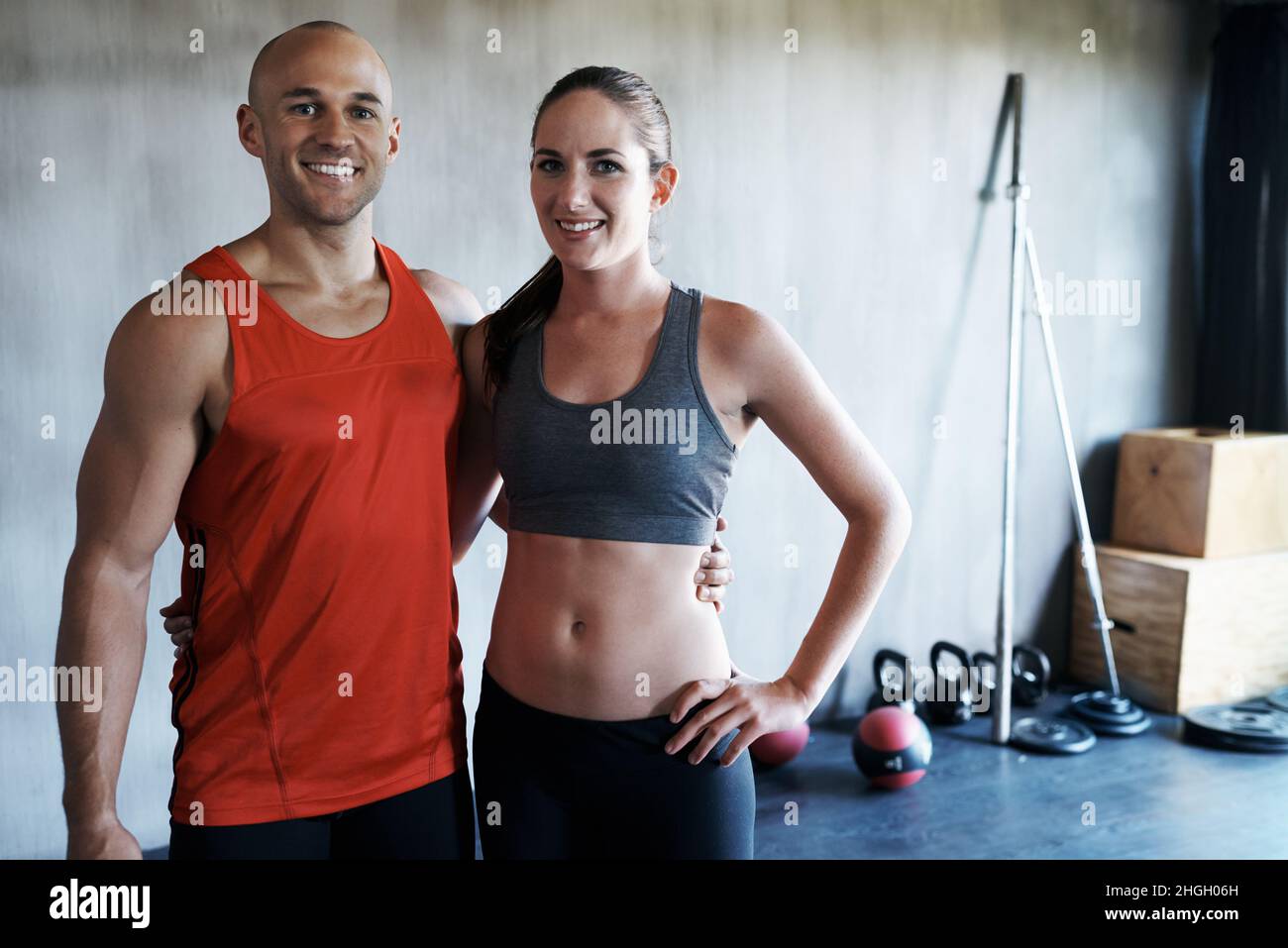 Training to become fighting fit. Portrait of a young couple training ...
