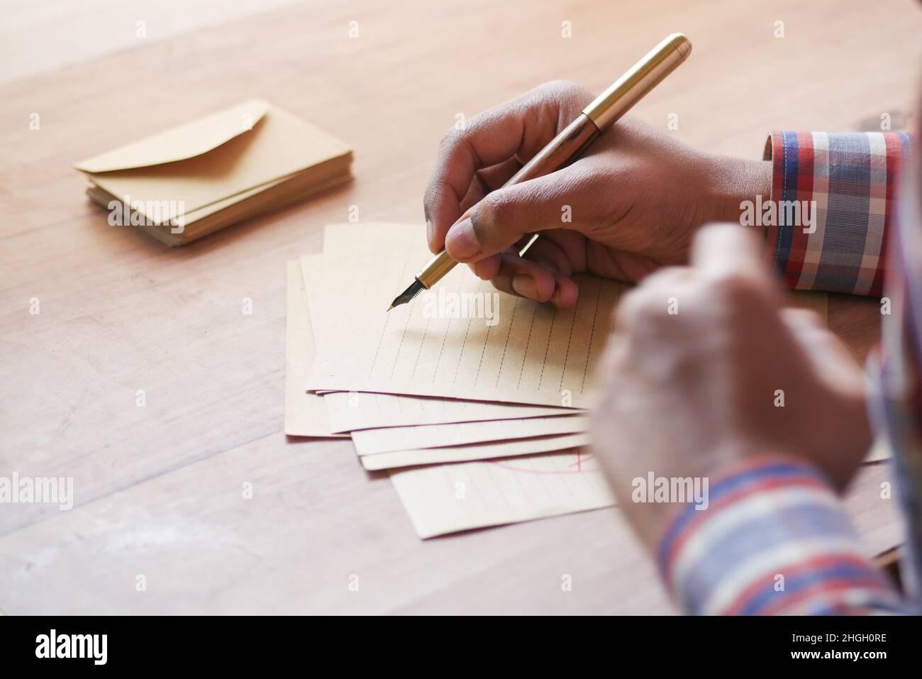 Old man writing letter hi-res stock photography and images - Alamy