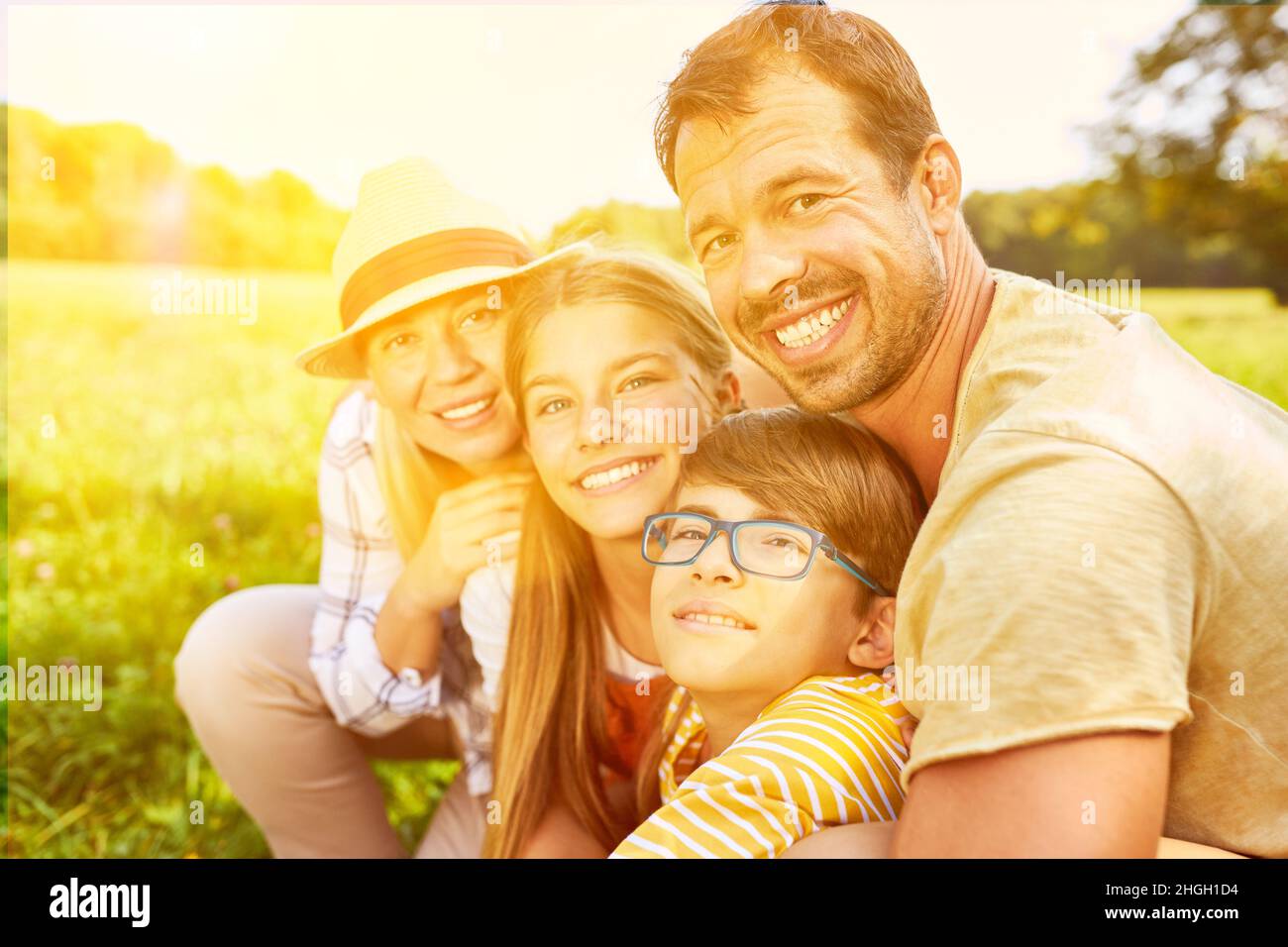 Happy family with two children makes trip to green nature in summer ...