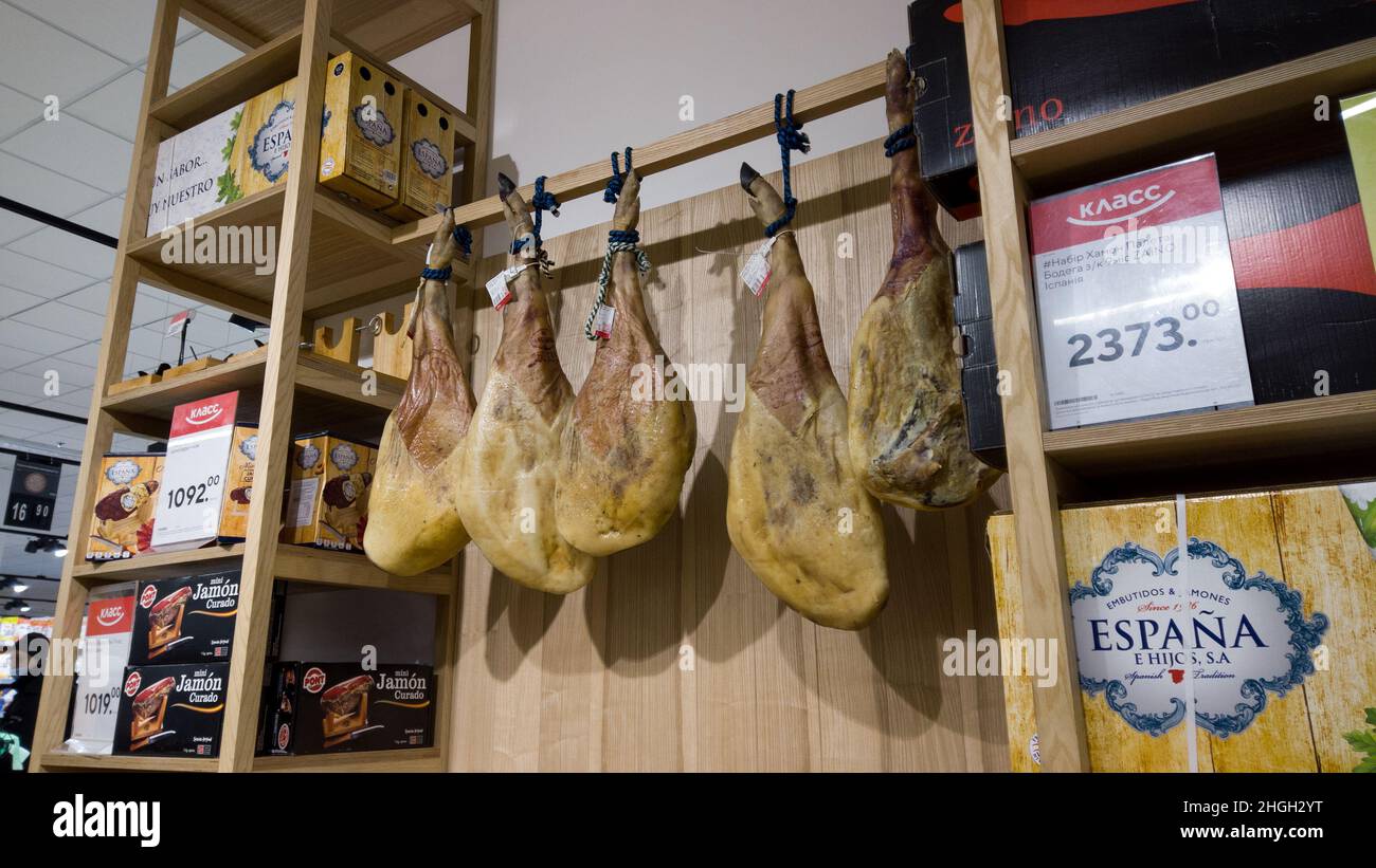Traditional Spanish jamon ham for sale at the market. Kharkiv, Ukraine ...