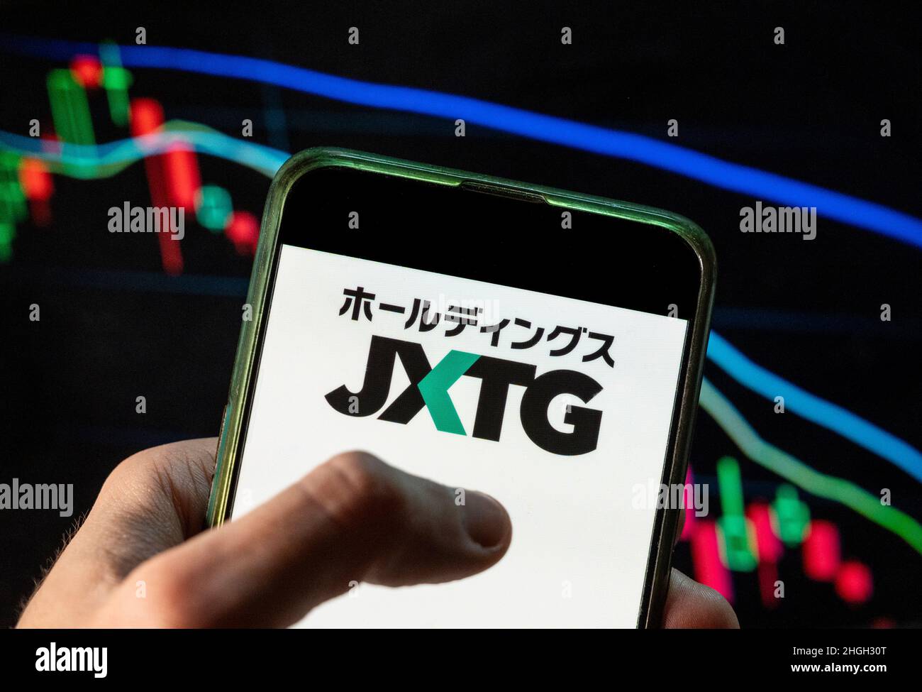 In this photo illustration the Japanese oil and gas conglomerate JXTG ...