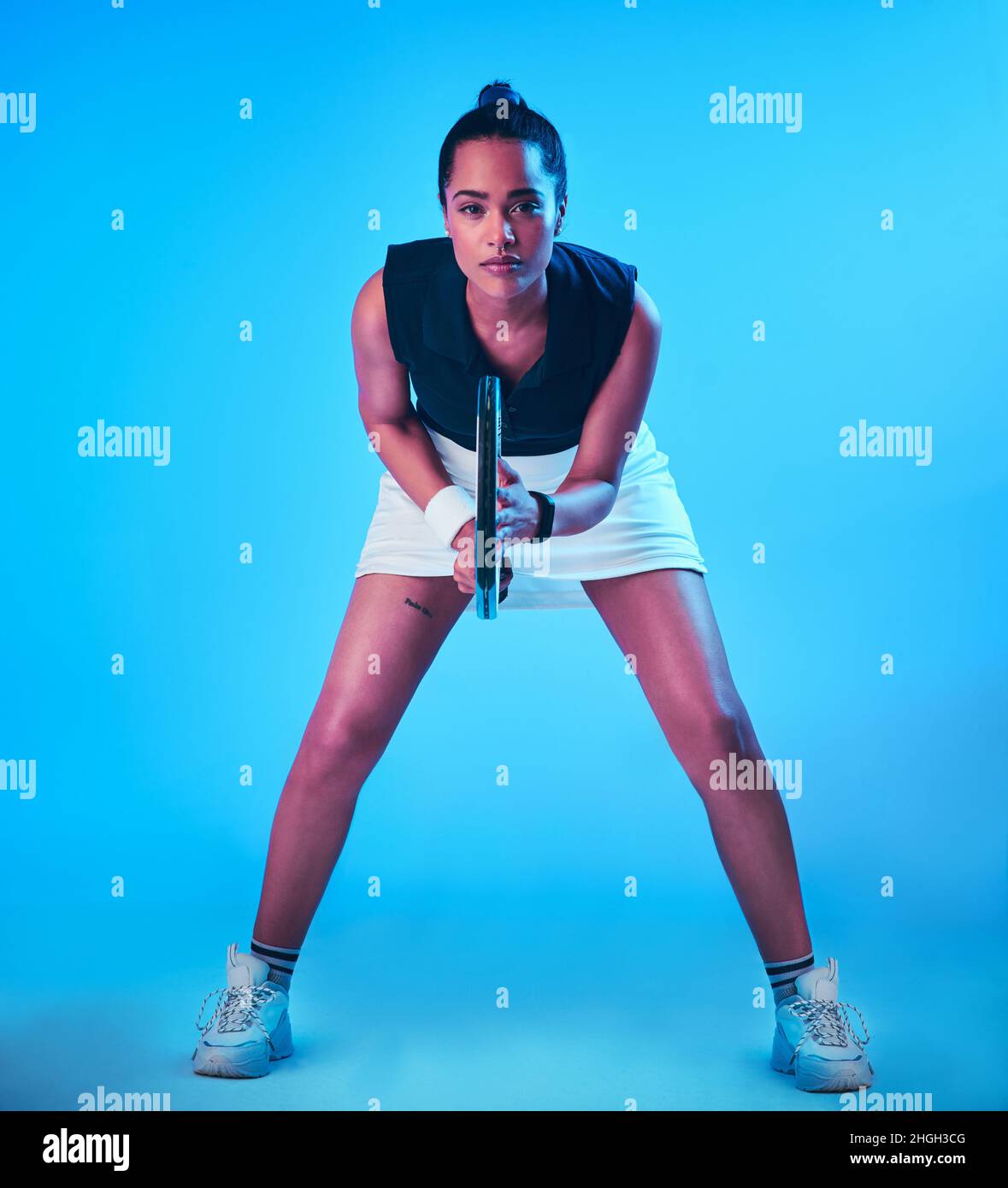Focused and ready. Full length portrait of an attractive young female ...