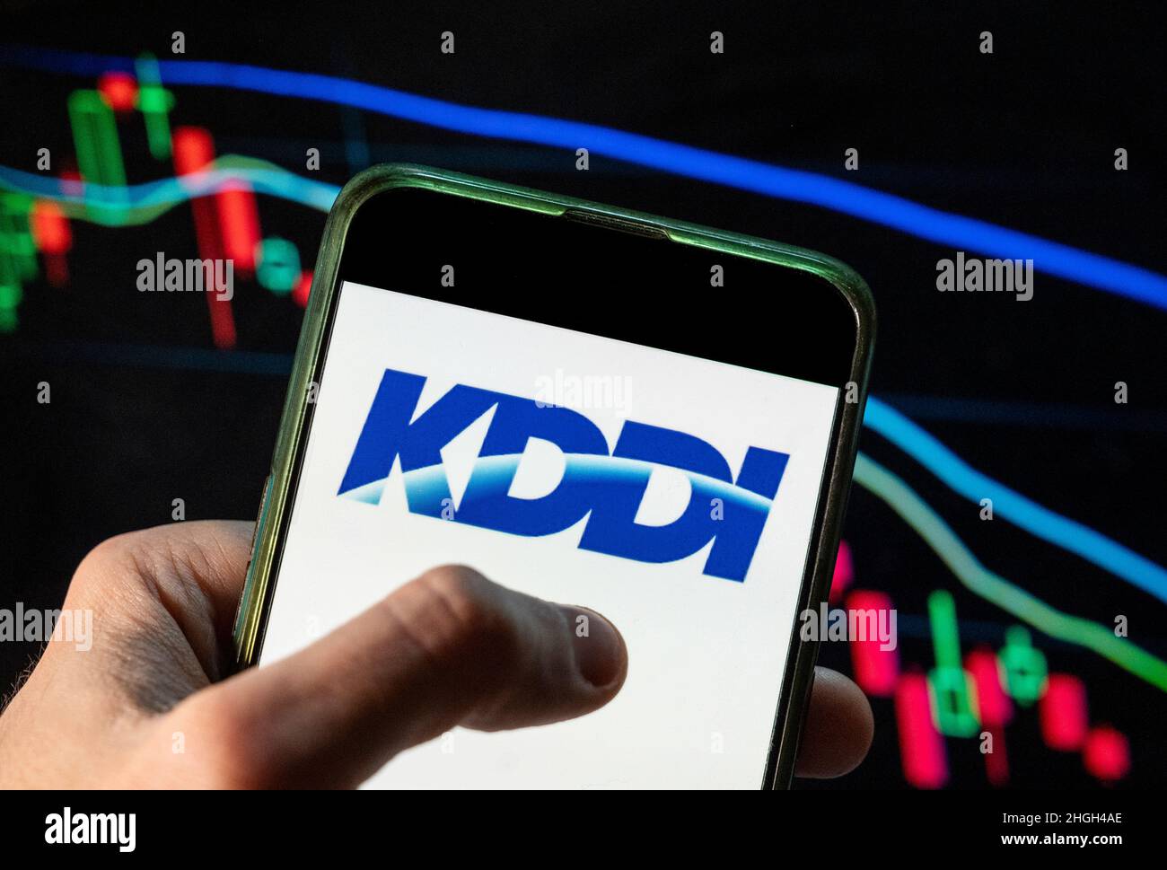 In this photo illustration the Japanese telecommunications operator company KDDI logo seen ...