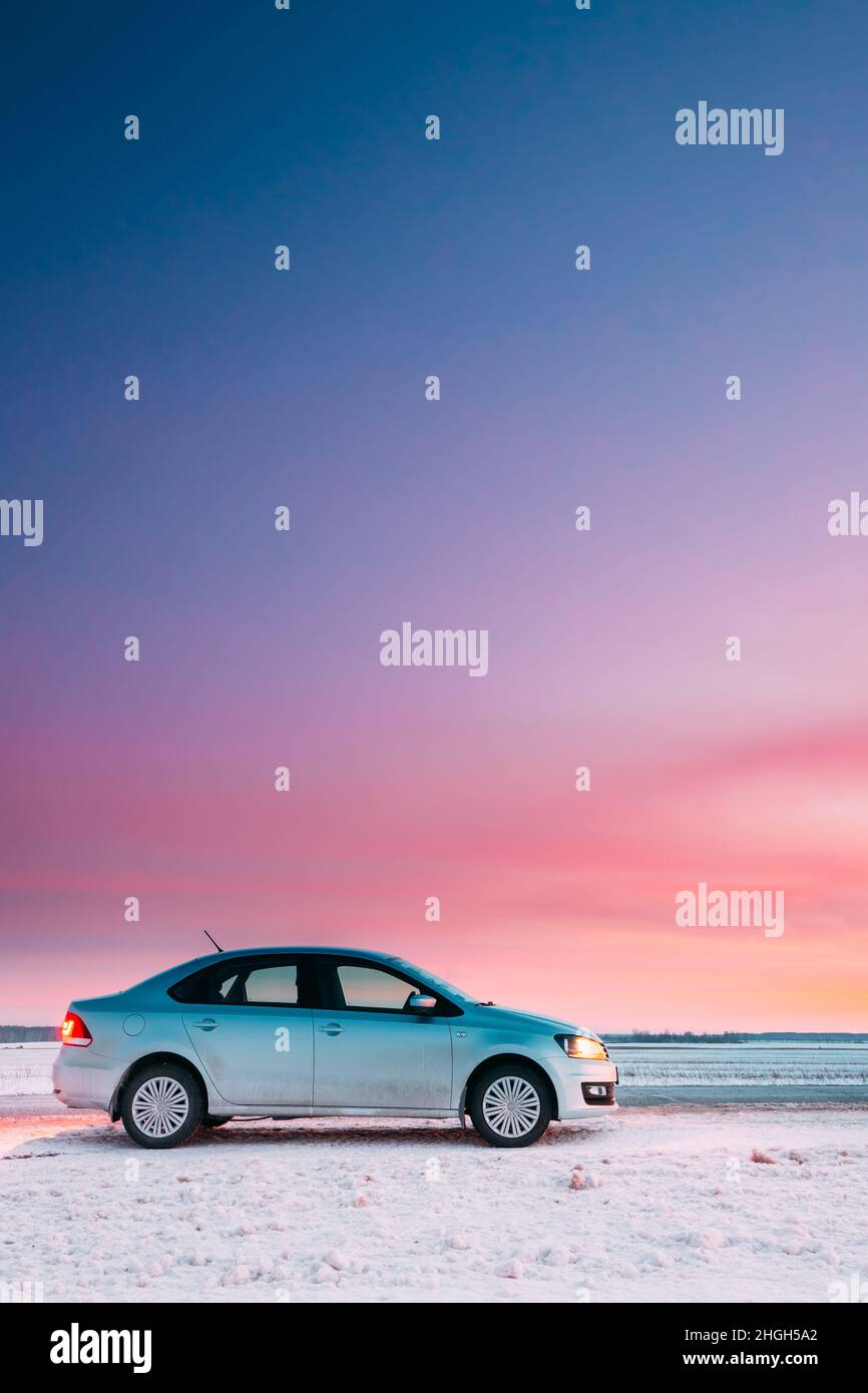 Volkswagen Polo Car Sedan Parking On A Roadside Of Country Road On A ...