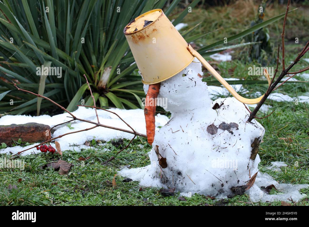Melted snowman in spring Stock Photo - Alamy