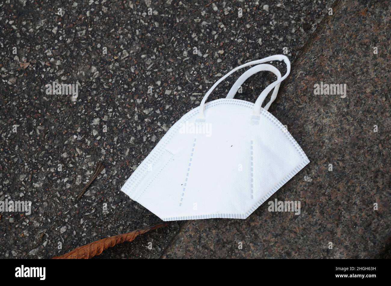 Copenhagen/Denmark./21 Januaryr 2022/ People throw used face mask on ...
