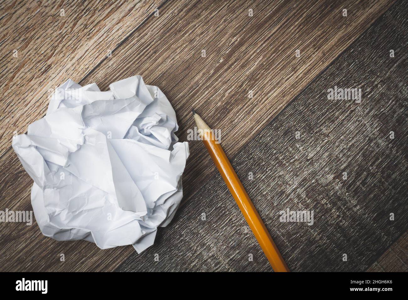 Crumpled and torn paper on the table. Torn piece of notebook. Paper ...