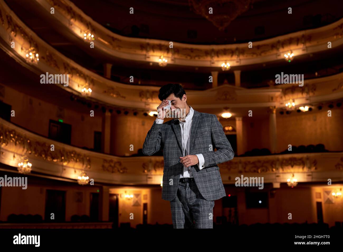 Actor Or Opera Singer In Suit Wiping Sweat From Face And Forehead With ...
