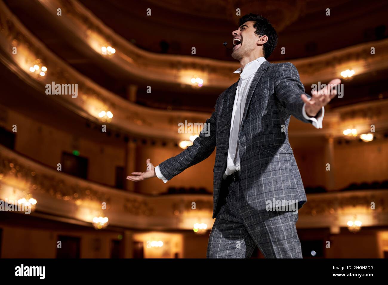 professional opera singer in elegant classic outfit, singing hit with ...