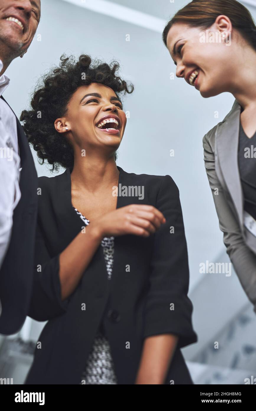 Businessman and woman laughter office hi-res stock photography and ...