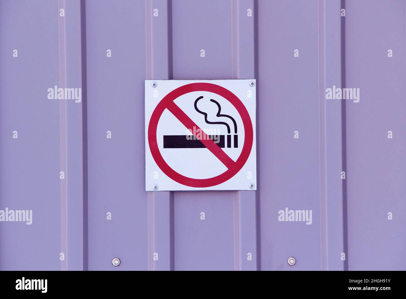 No smoking sign on profiled sheeting wall, concept of health care ...