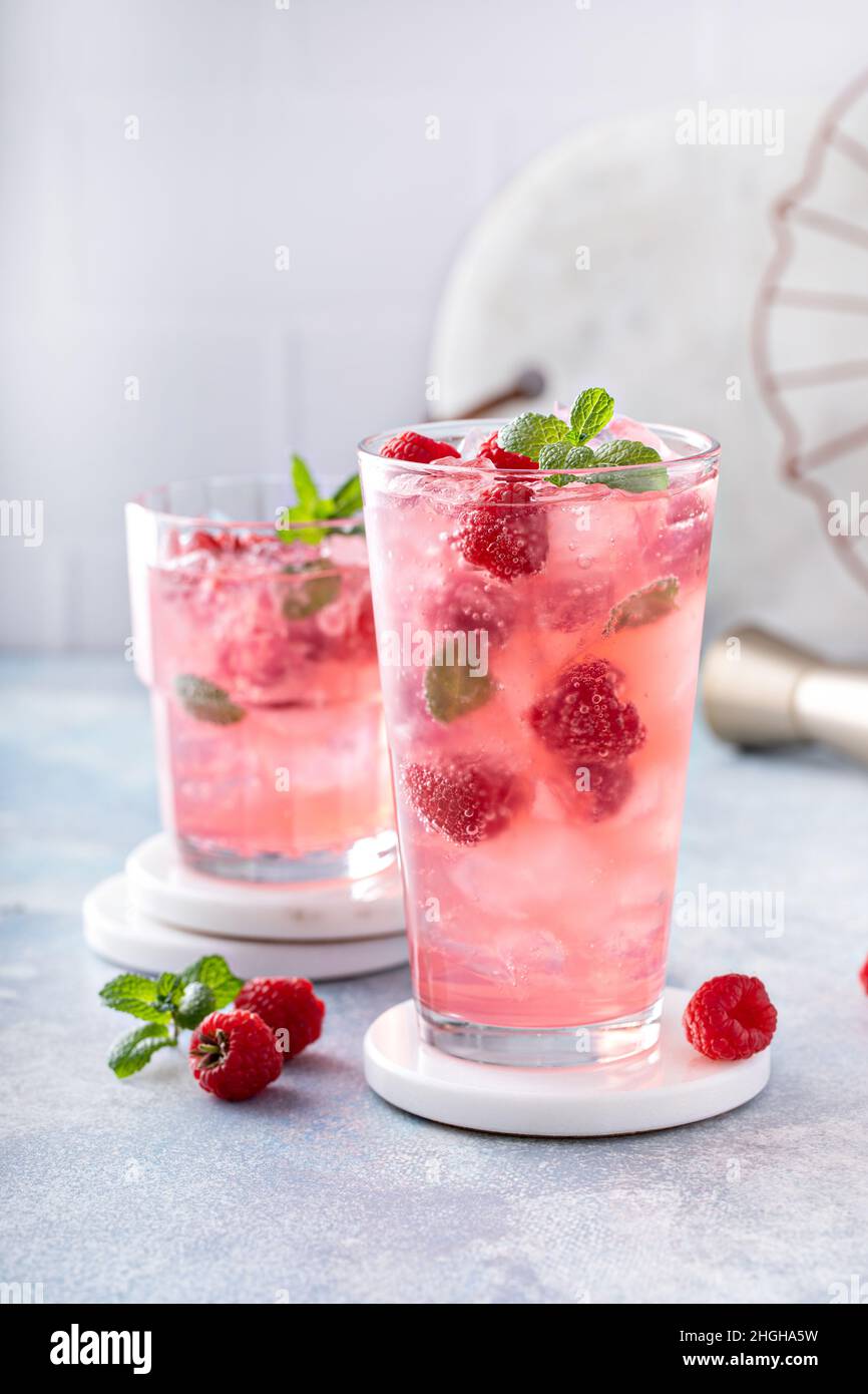 Spring or summer cocktail with raspberry and mint Stock Photo - Alamy