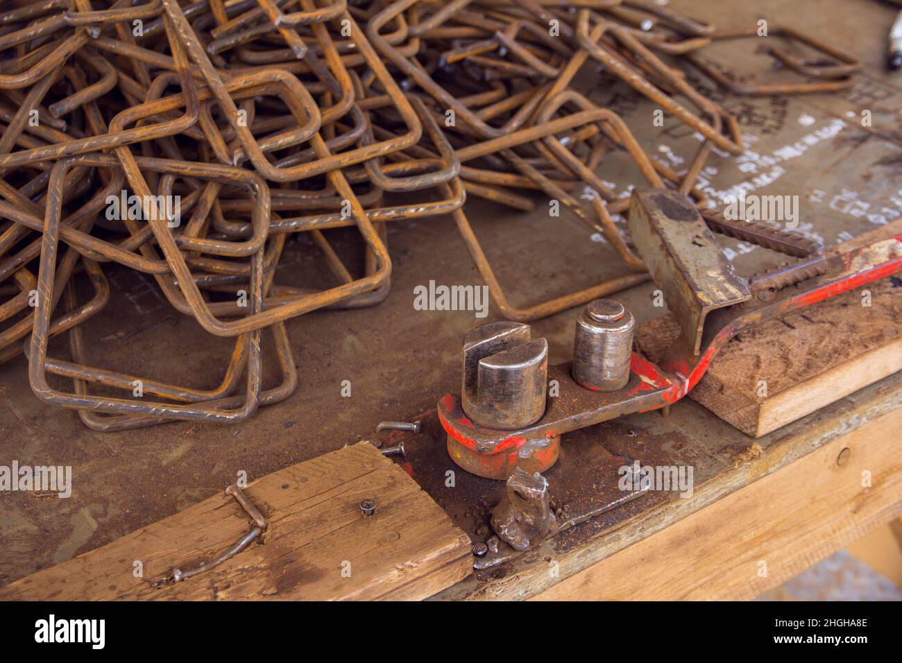 Assembly of reinforcing bars for pouring concrete. Hand tool for ...