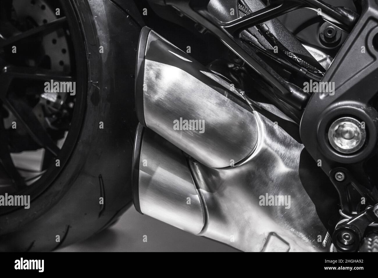 Sports motorcycle engine fragment with exhaust pipes, close up photo ...