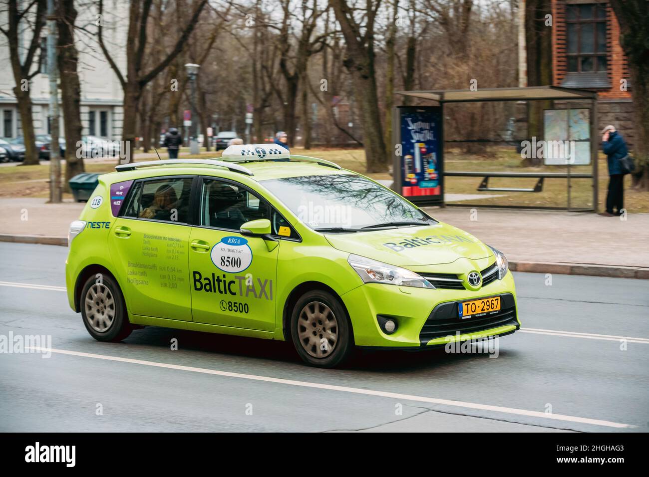 Riga, Latvia. Toyota Verso Car From Baltic Taxi Moving On Kalpaka ...