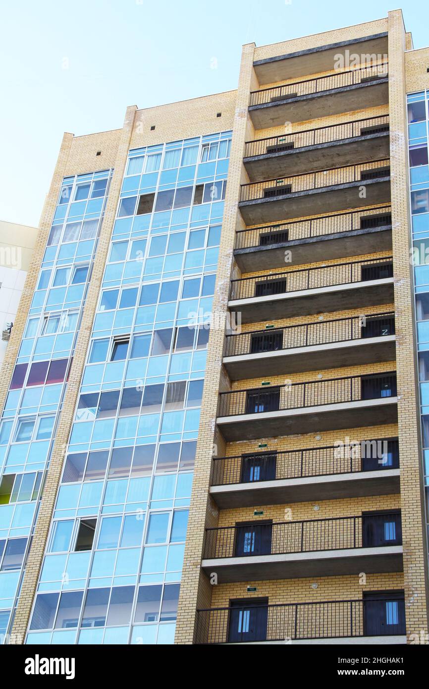 Modern urban architecture, rows of windows reflecting the sky. The ...