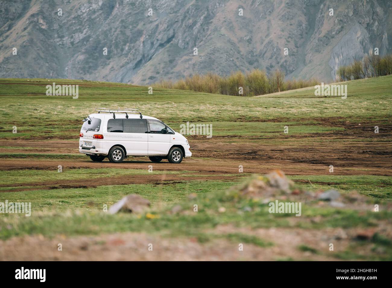 Mitsubishi Delica Space Gear on off road in Georgian summer mountains ...
