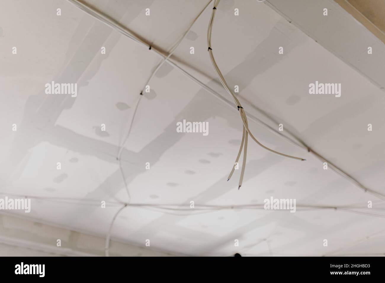 Electric Wires network Mounted on Ceiling Stock Photo - Alamy