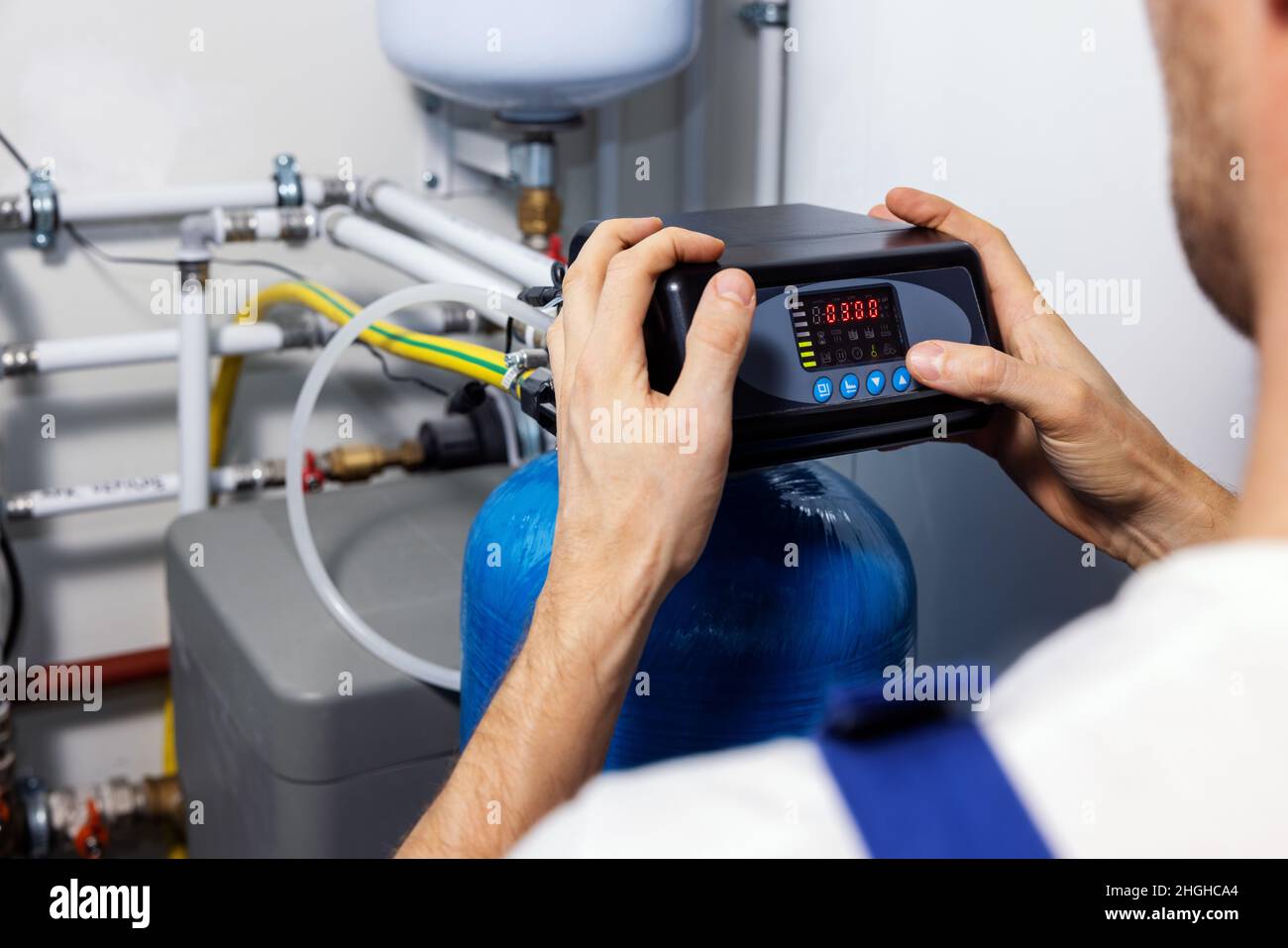 worker set up house water purification and filtration system Stock ...