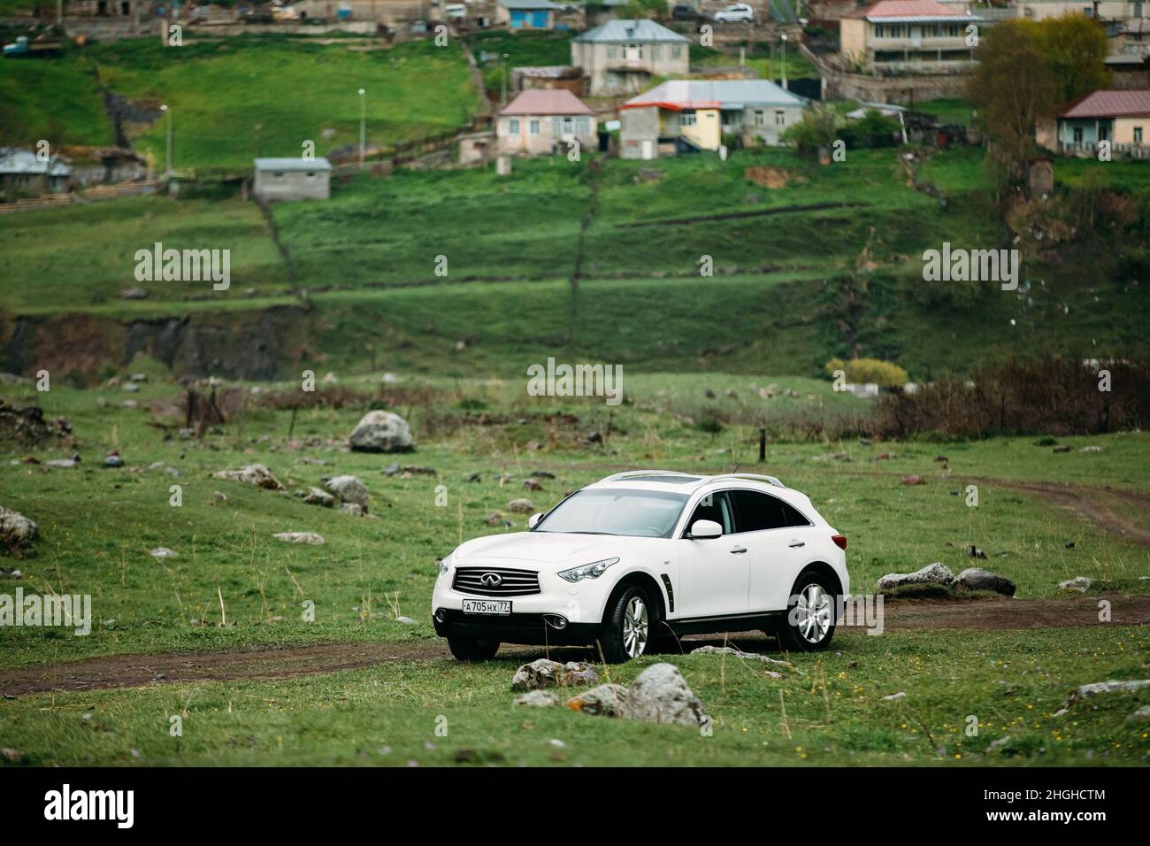 White Infiniti FX30d turbo diesel SUV Car On Off Road In Spring ...