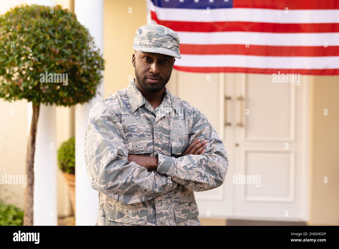 Portrait of confident african american army man in uniform with arms ...