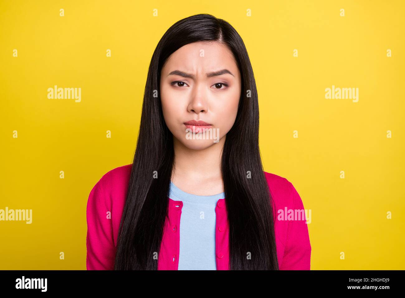 Photo of unhappy upset doubtful young woman distrust puzzled face ...