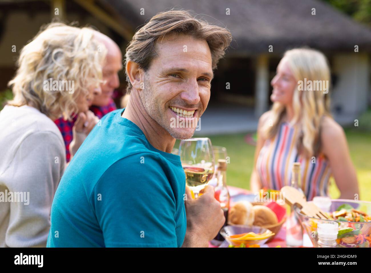 Casual family man portrait sitting hi-res stock photography and images ...