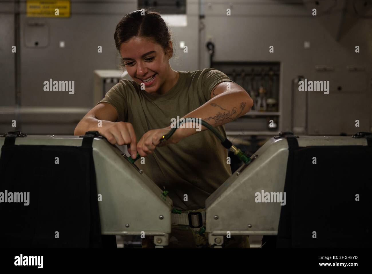 U.S. Air Force Senior Airman Kathleen Cook, a loadmaster with the 7th ...