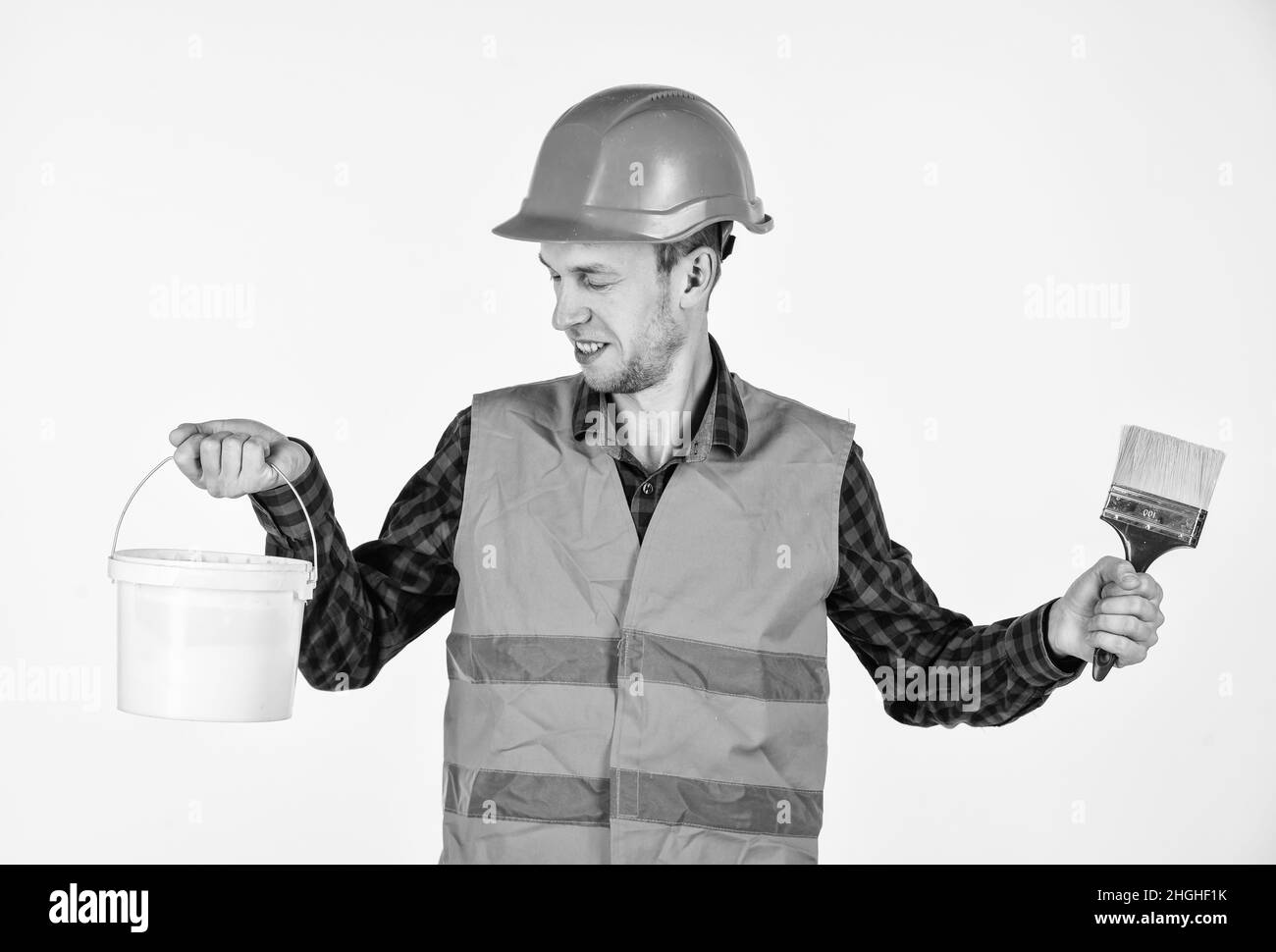 real painter worker in helmet. carpenter ready to work. building tool ...