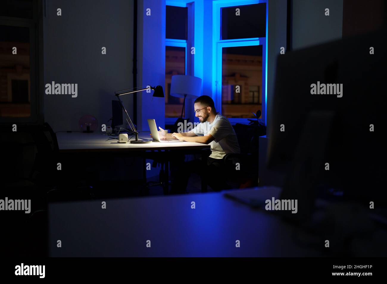 Workaholic man stay in office overtime prepare for business ...