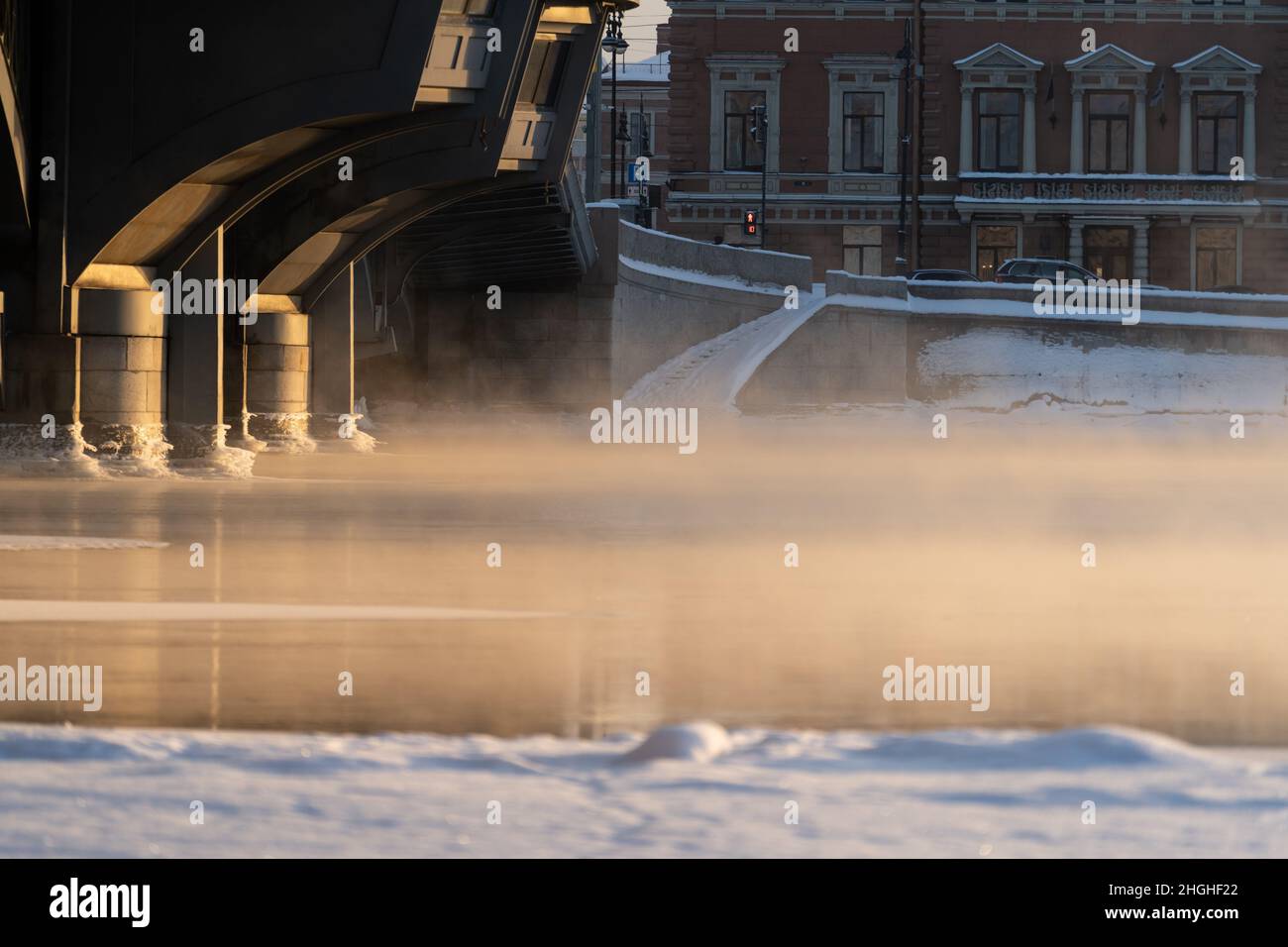Steam comes out of river in the city, soaring from the severe cold ...