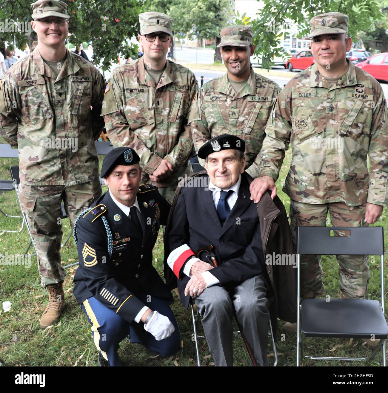 ASG-P and 1st ID FWD Soldiers pose for a picture with a survivor of the ...