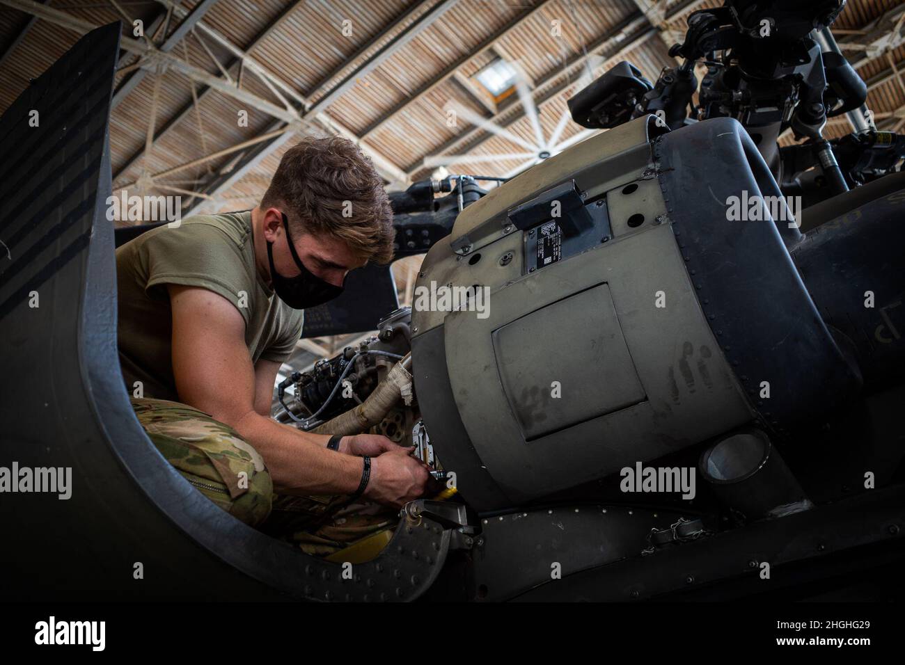 Aircraft maintainer with 4th Battalion, 3rd Aviation Regiment works on ...