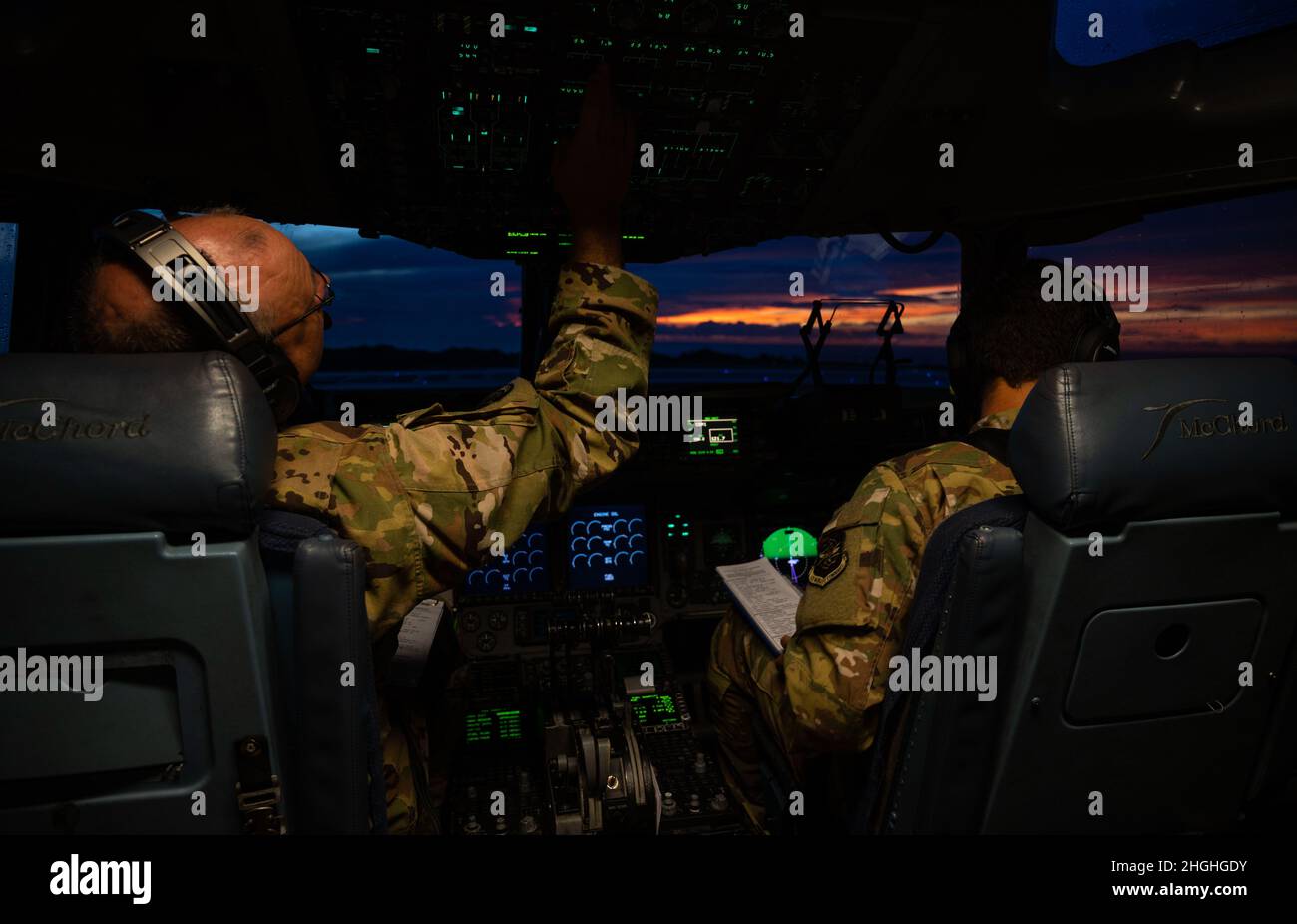 U.S. Air Force Lt. Col. Timothy Garland, left, a pilot with the 7th ...