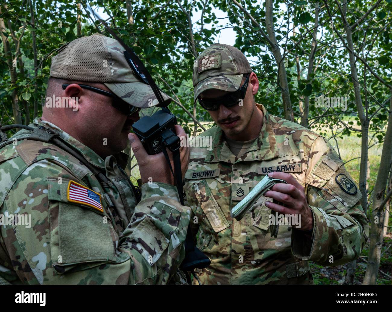 U.S. Army Staff Sgt. Wyatt Brown, right, 2-211th Army Regiment flight ...