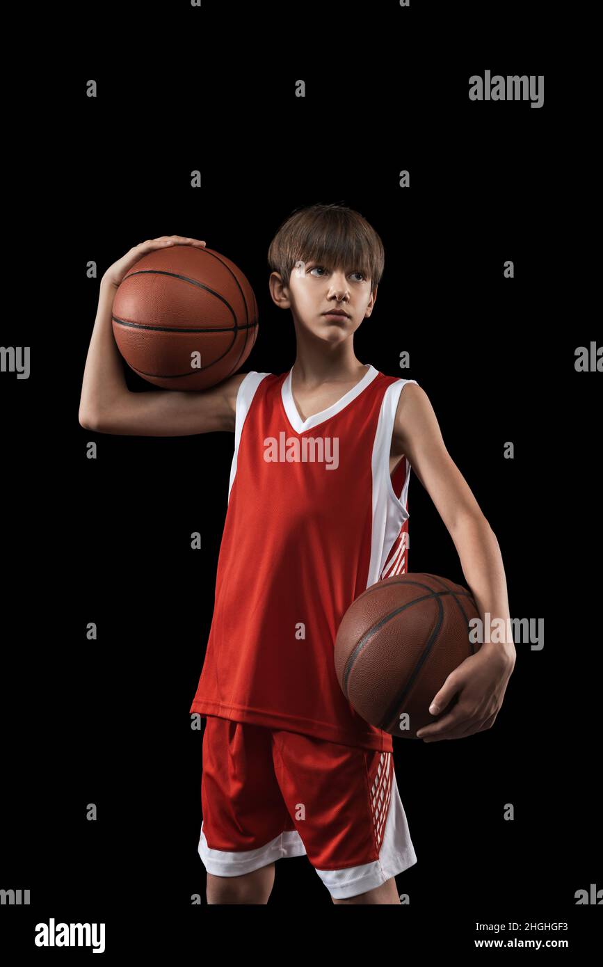 Young boy posing basketball ball hi-res stock photography and images ...