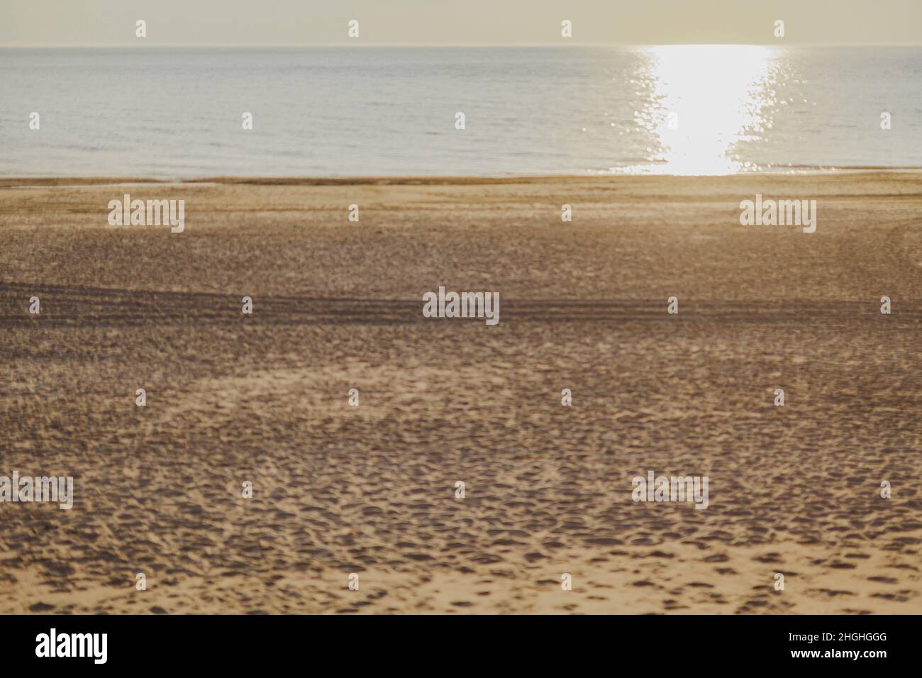 empty wide beach against blue ocean Stock Photo - Alamy