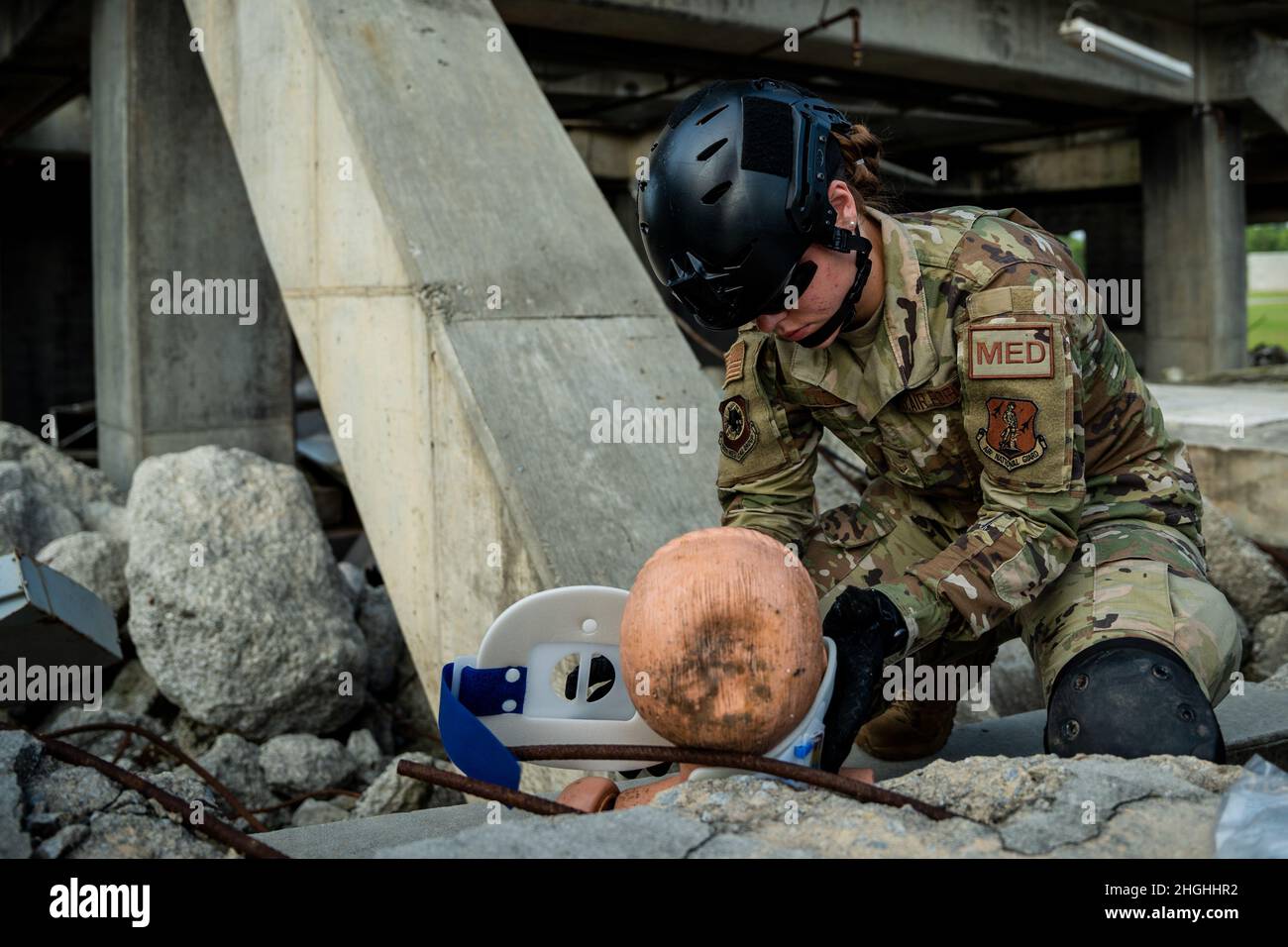 Airman 1st Class Sarah Lucas, 139th Medical Group medic, applies a neck ...