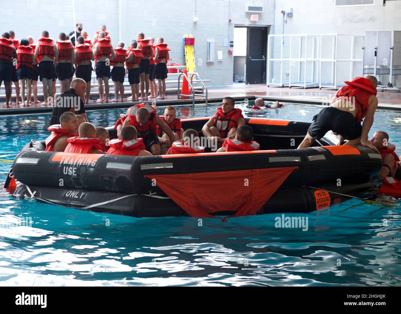 Recruits participate in an abandon ship exercise in the USS ...